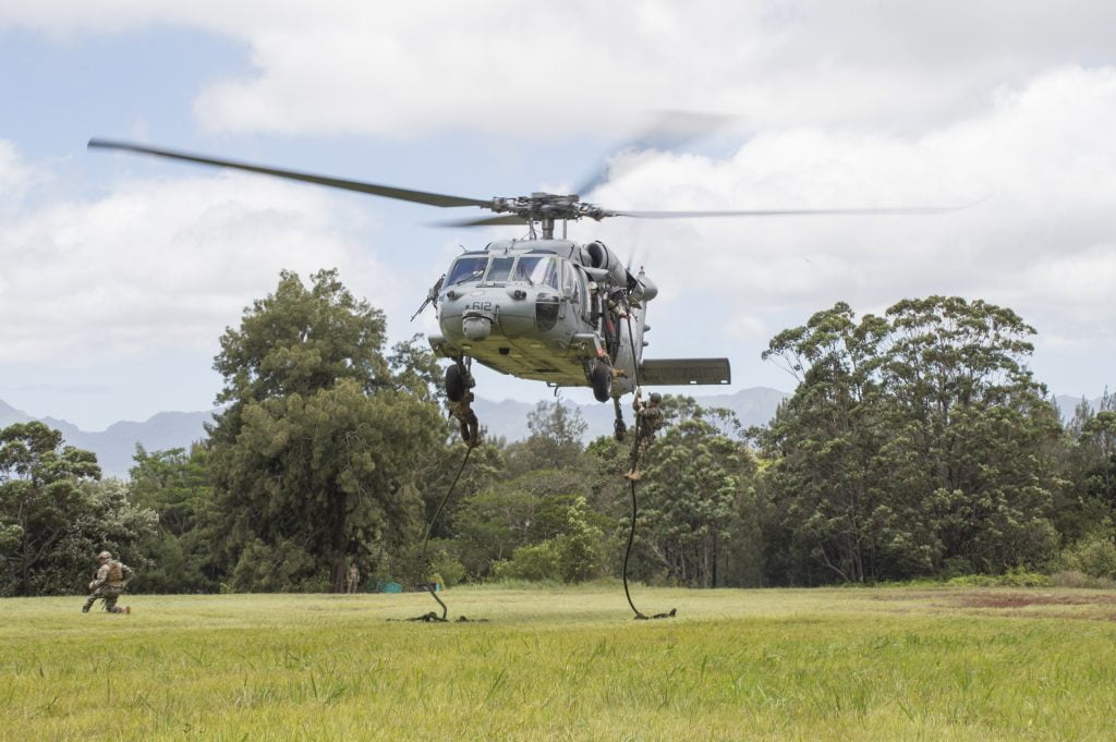 SOF Teams conduct Fast Rope Insertion & Extraction System training ...
